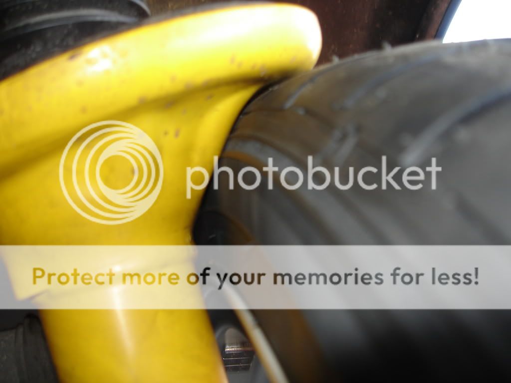 Tire hitting strut perch in front